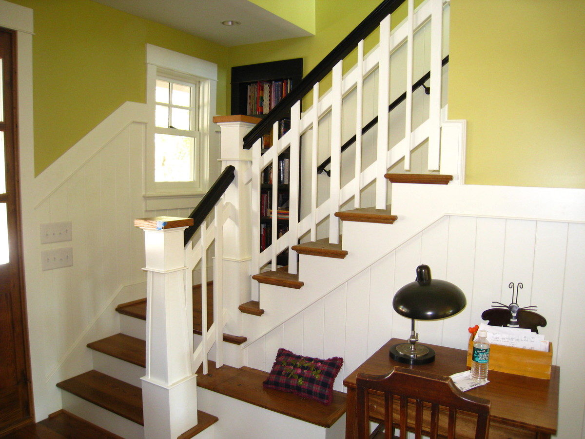 Floating handrail with custom newels - FineWoodworking