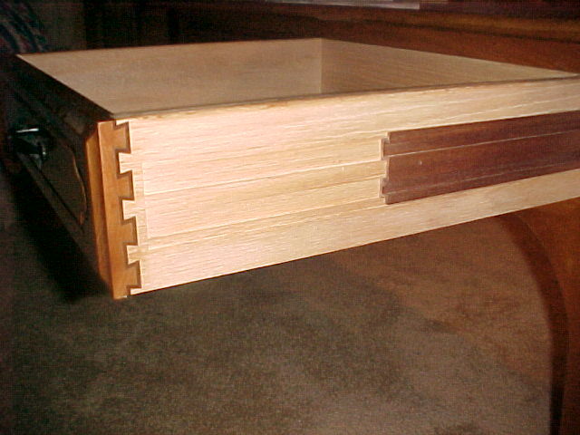 Sliding dovetail drawer guides - FineWoodworking