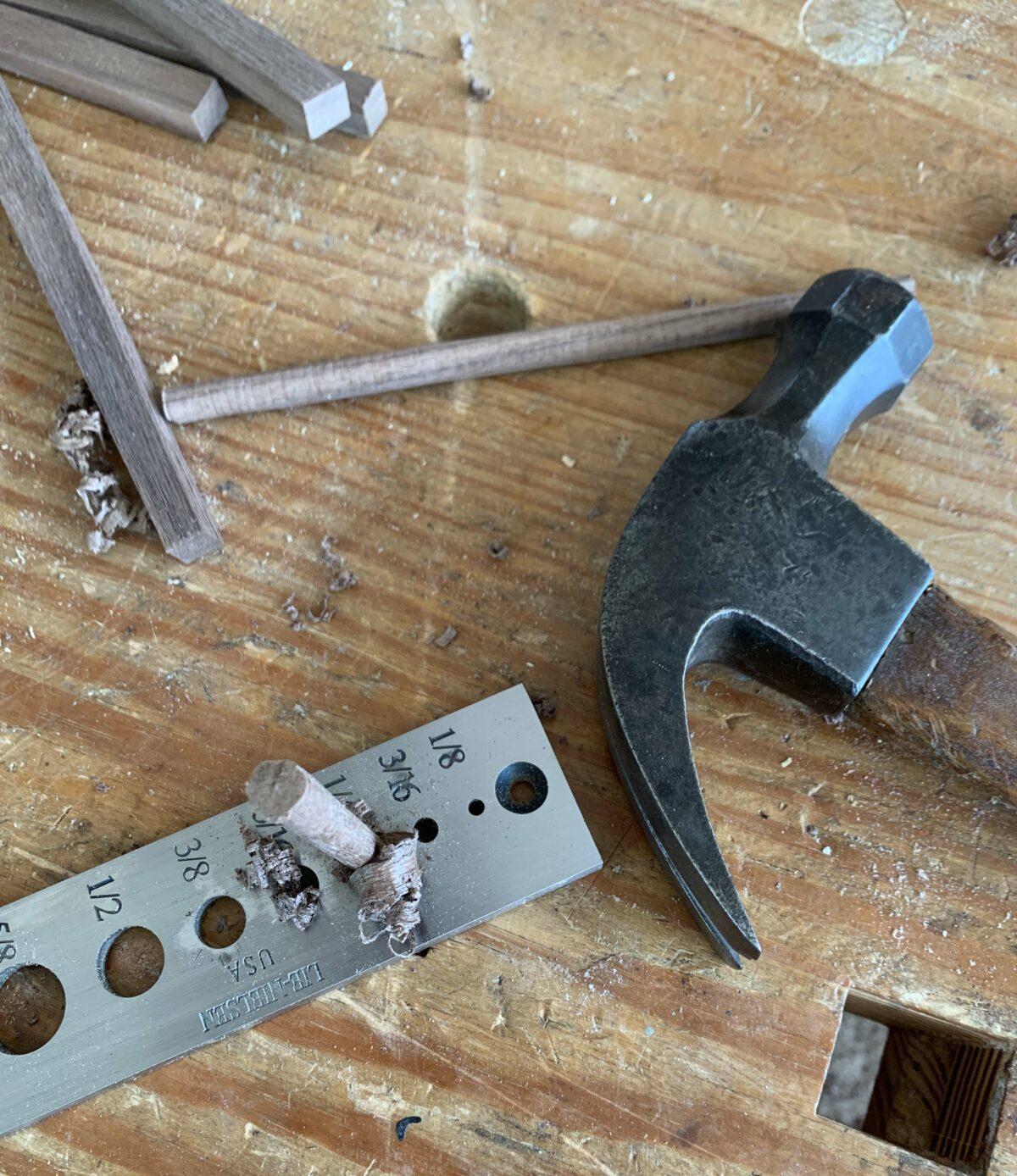 Using a dowel plate to peg a Shaker cat table - FineWoodworking