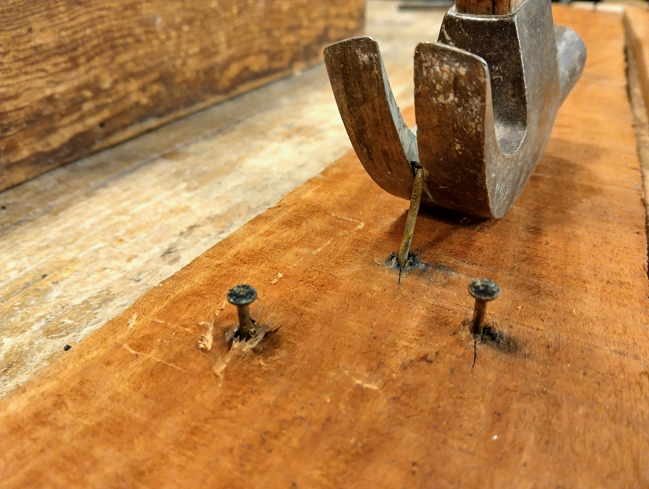 Pulling nails out of wood store