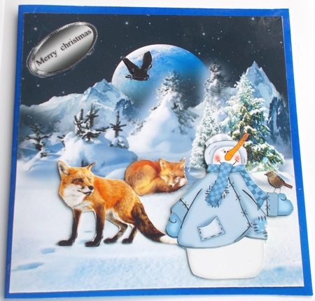 snowman and foxes - Photo by Sharon Wilson