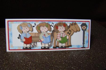 Christmas Carol Singers with Donkey Dl - Photo by Beverly Carmichael