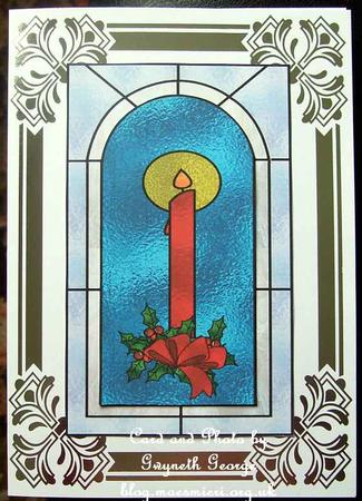 Candle in Stained Glass Window Pyramids - Photo by Gwyneth George