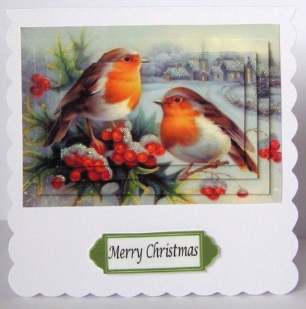 two lovely little robins with a snow village pyramids - CUP898738_415 ...