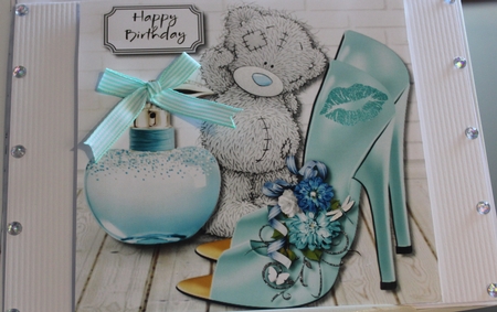Tatty teddy with shoes and perfume - Photo by Ornella