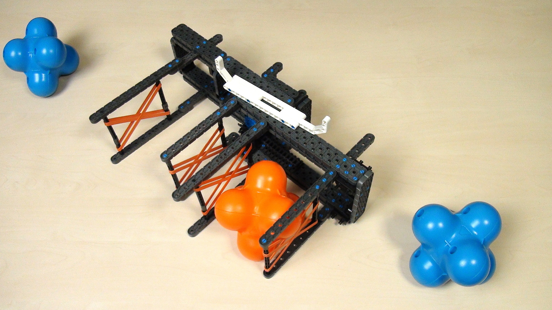FLLCasts | VEX IQ Crossover. Task. Add the grabbing attachment to a