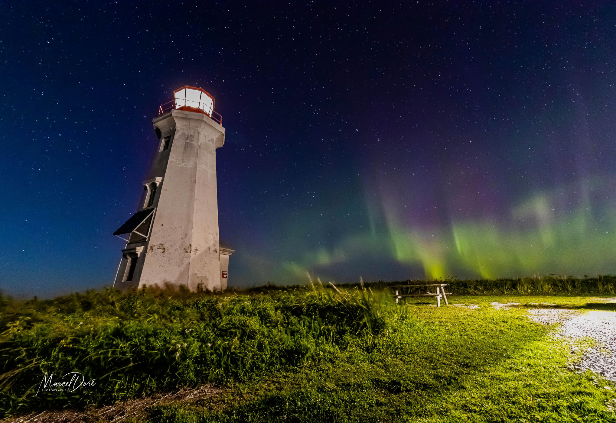 Le phare devant l'aurore boréale, by the artist Marcel Doré | Gallea