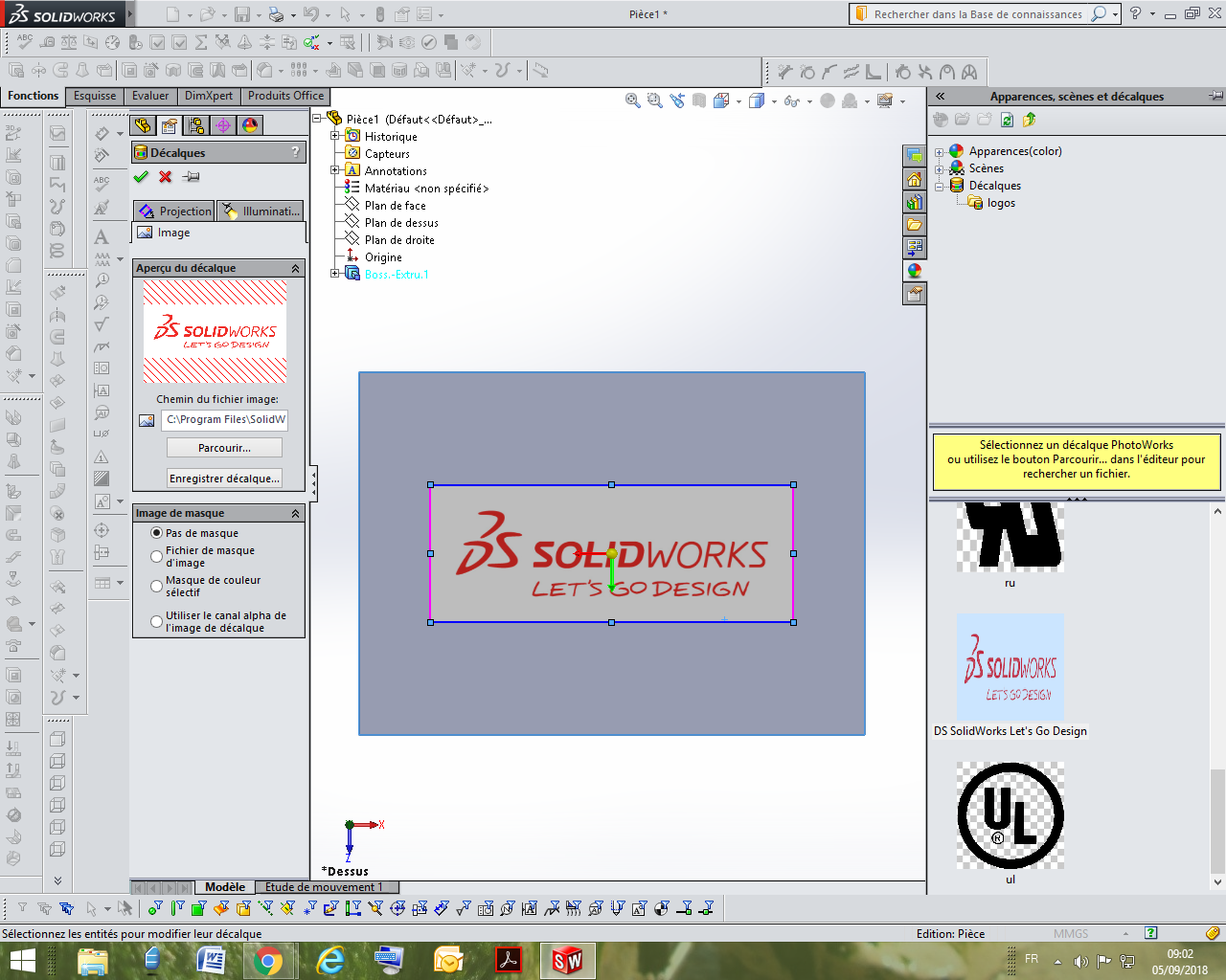 How do I engrave a logo on an extruded base in SolidWorks? | GrabCAD ...