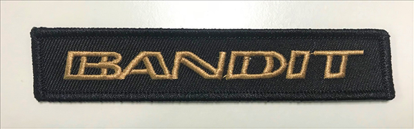 Black patch with GOLD embroidered BANDIT logo. The perfe...