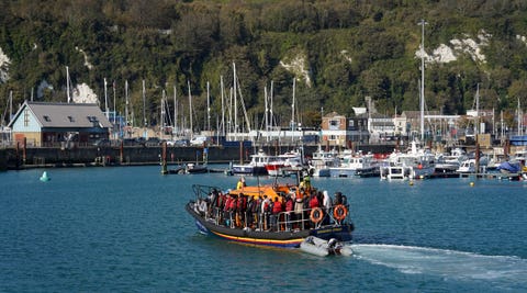 Record 853 migrants cross English Channel in small boats in single day