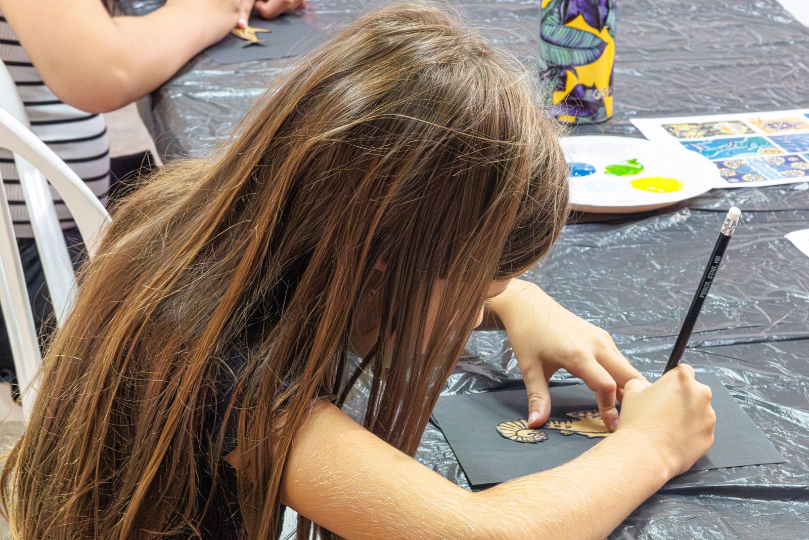 Children create aboriginal art in fun workshop