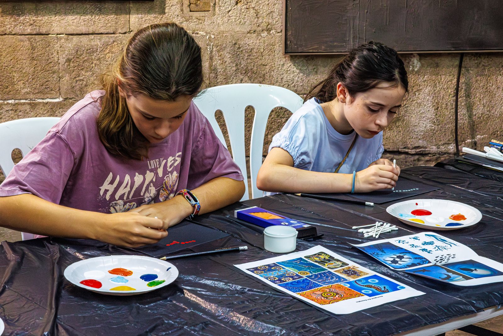 Children create aboriginal art in fun workshop