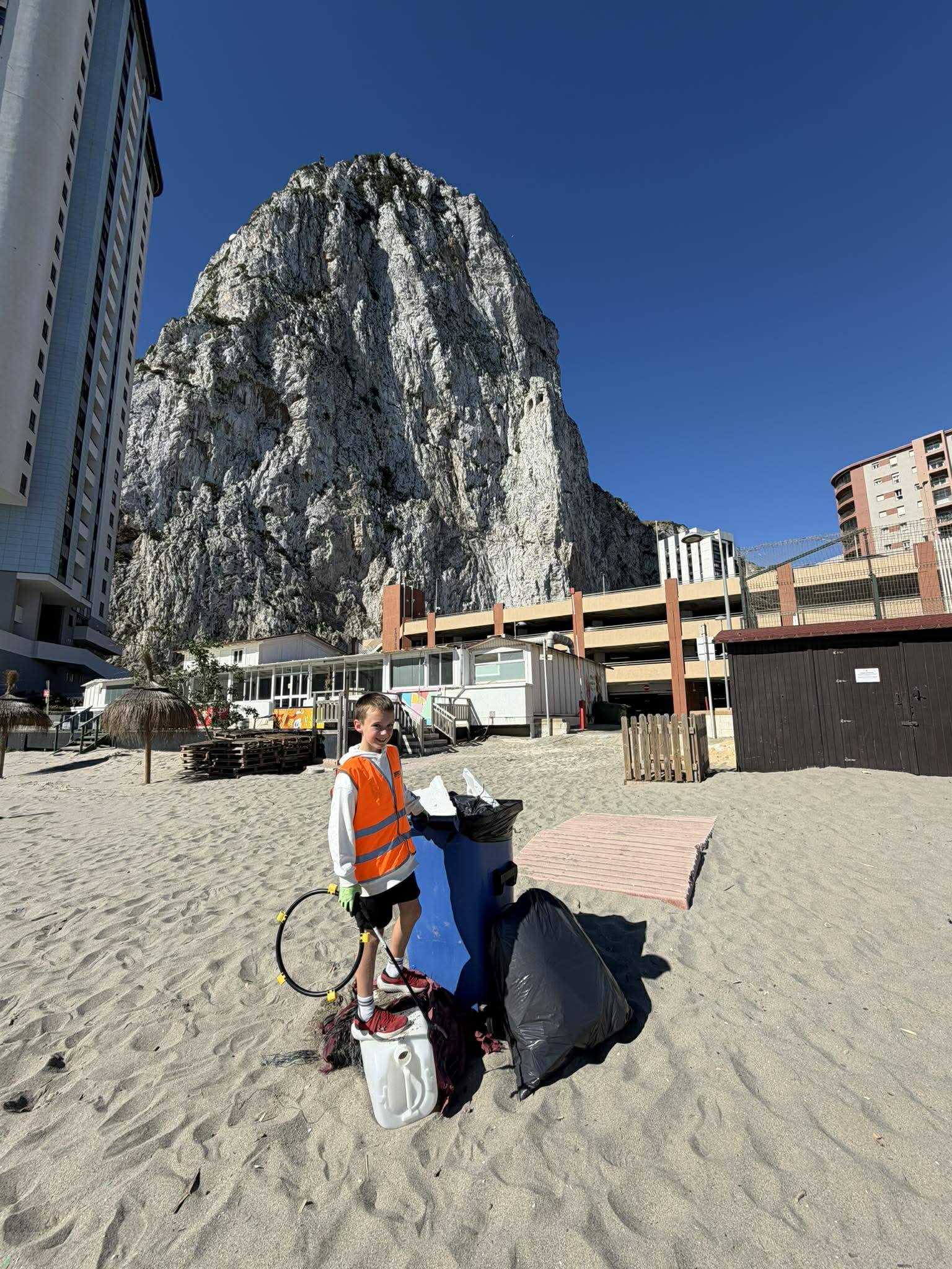 Grandfather and grandson set example with Eastern Beach clean-up