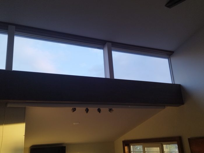 New construction. LVL header flush with rafters versus rafters sitting ...