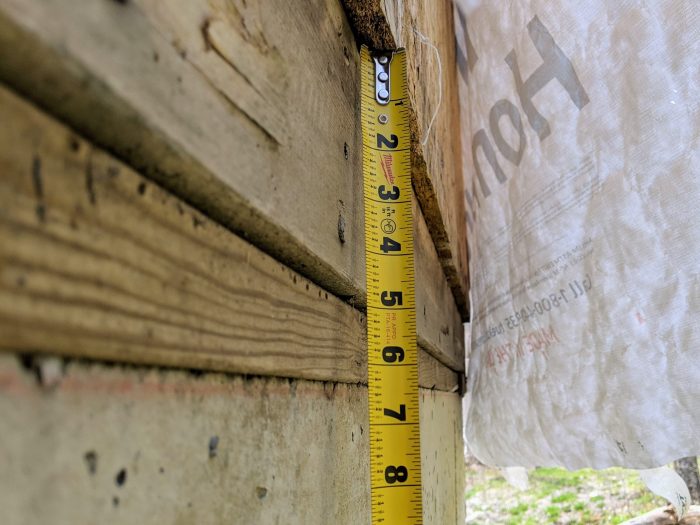 Seal sheathing or house wrap to foundation before vinyl siding ...