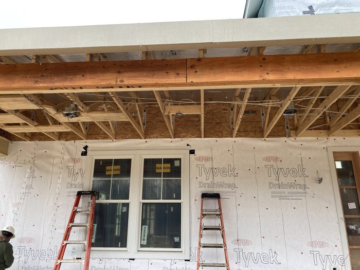 Vented roof with trusses that extend over porch - GreenBuildingAdvisor
