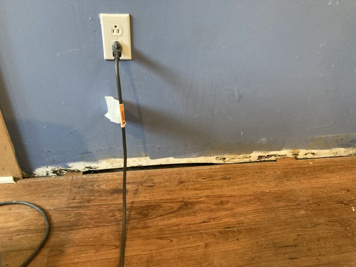 Black mold behind baseboards in basement - GreenBuildingAdvisor