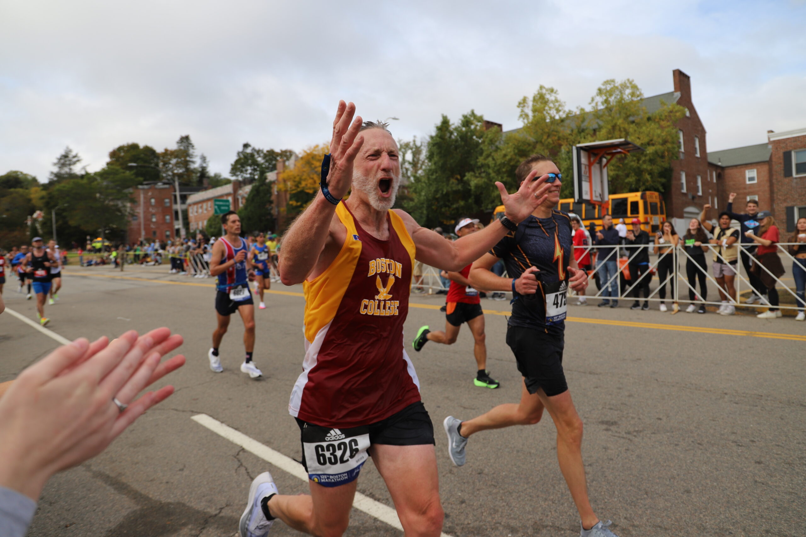 Students eagerly cheered on return of the Boston Marathon to campus ...