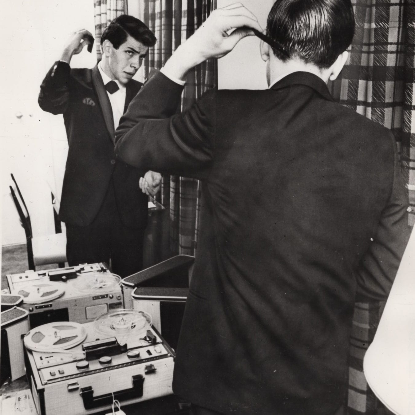 Frank Sinatra Jr. Combs Hair In Front Of Mirror, London - Holden Luntz ...