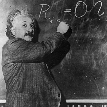 Albert Einstein Writing on Blackboard - Holden Luntz Gallery