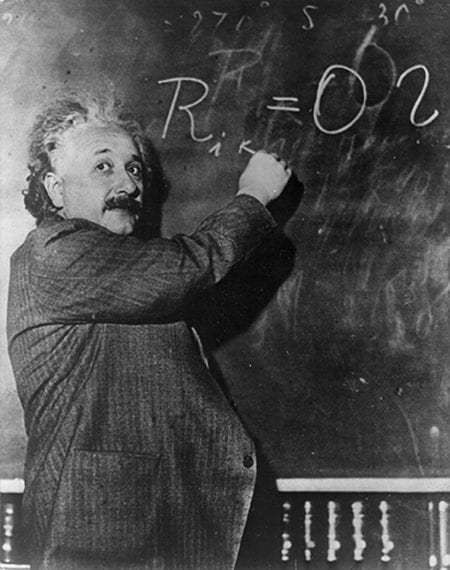 Albert Einstein Writing on Blackboard - Holden Luntz Gallery