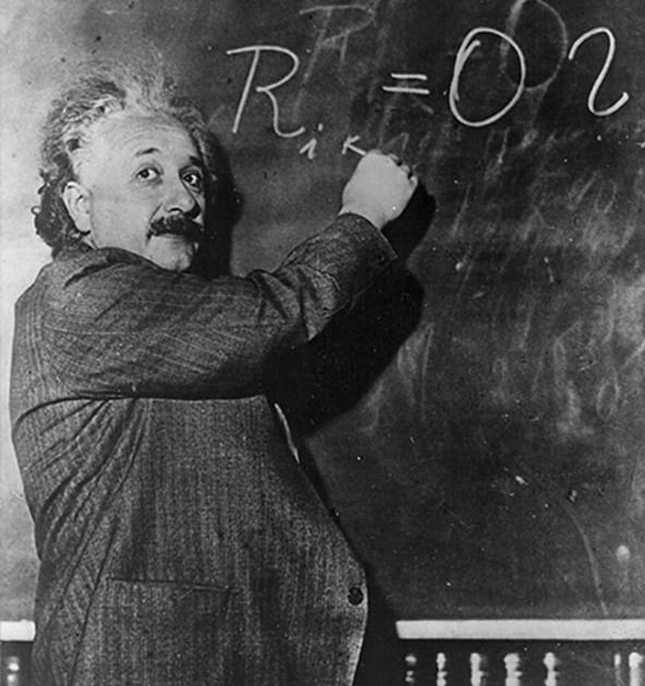 Albert Einstein Writing on Blackboard - Holden Luntz Gallery