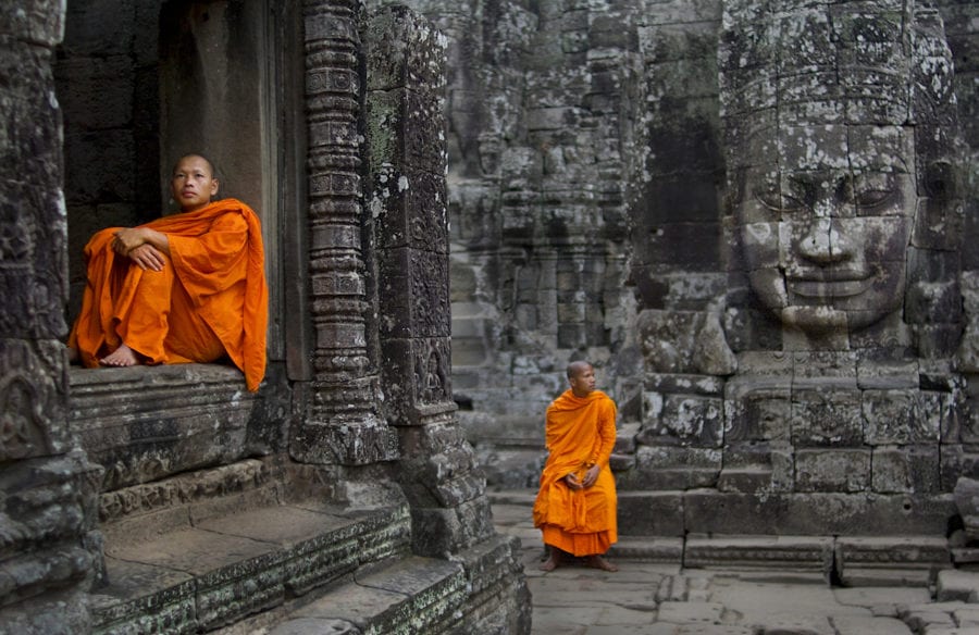 Monks Resting at Bayon Temple Angkor, Cambodia - Holden Luntz Gallery