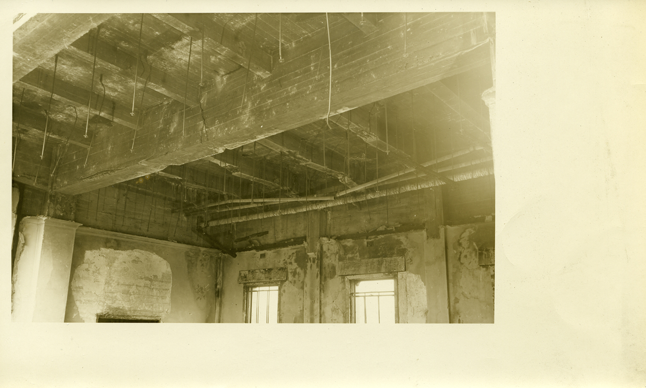 Roof Damage/Interior view showing roof damage of building 5H-19 (5-H ...