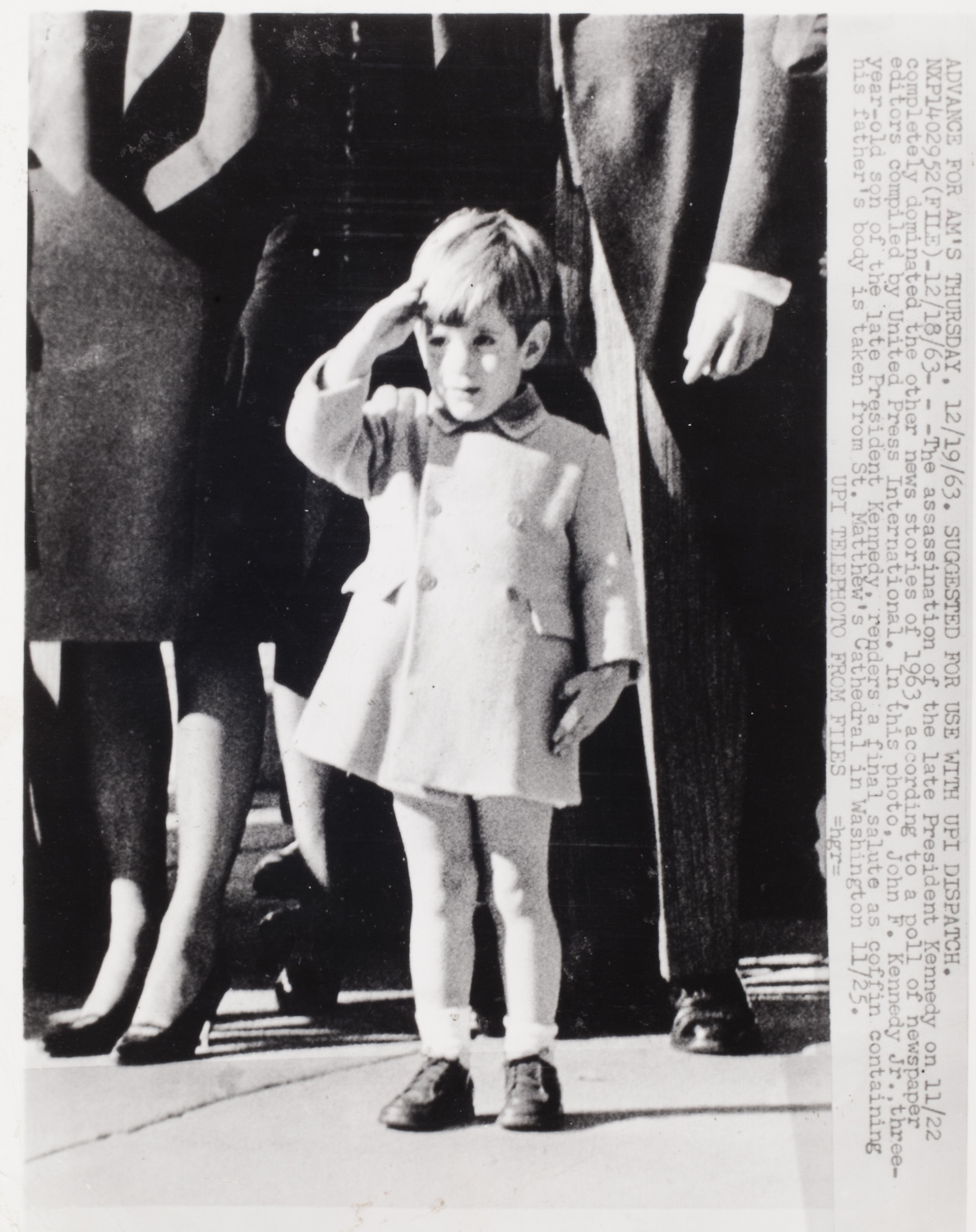 [John F. Kennedy, Jr. saluting the coffin containing his father, John F ...