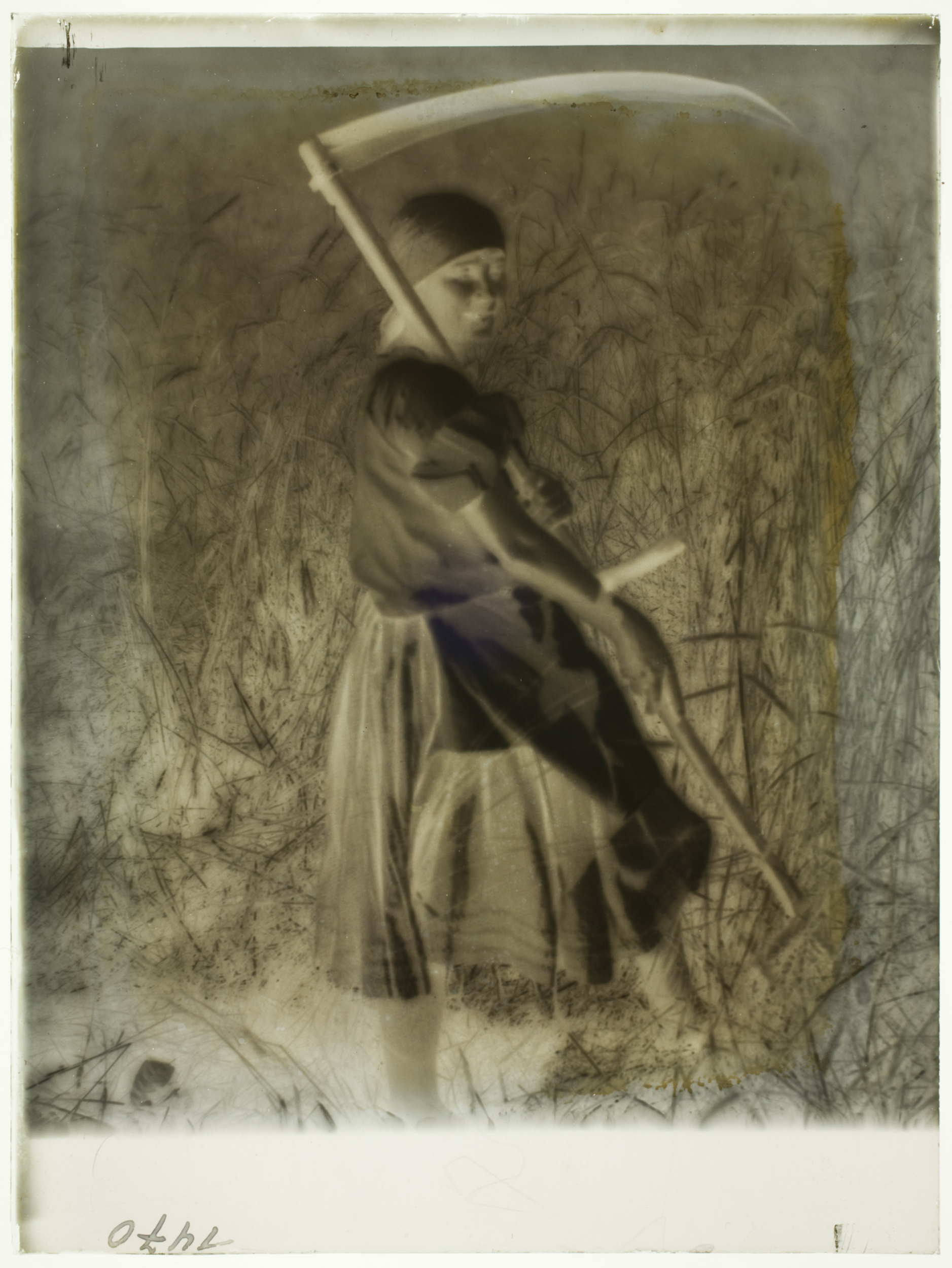 [Woman holding scythe] | International Center of Photography