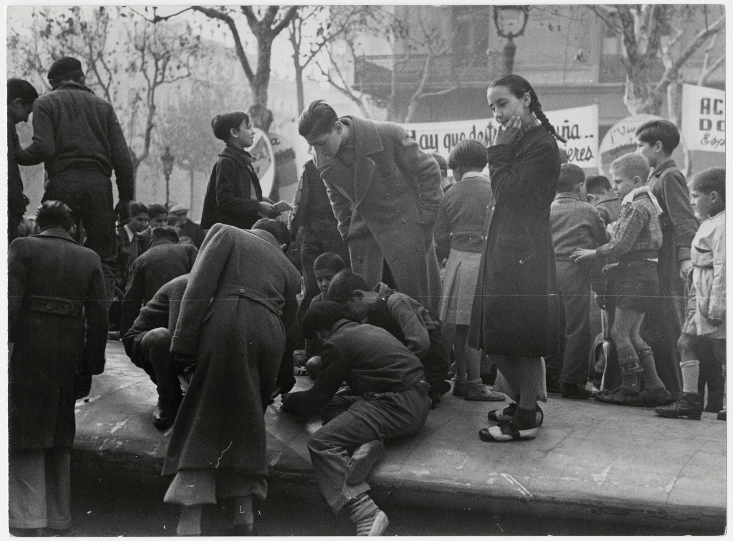 [Children playing on a downed German bomber-plane on display, Barcelona ...
