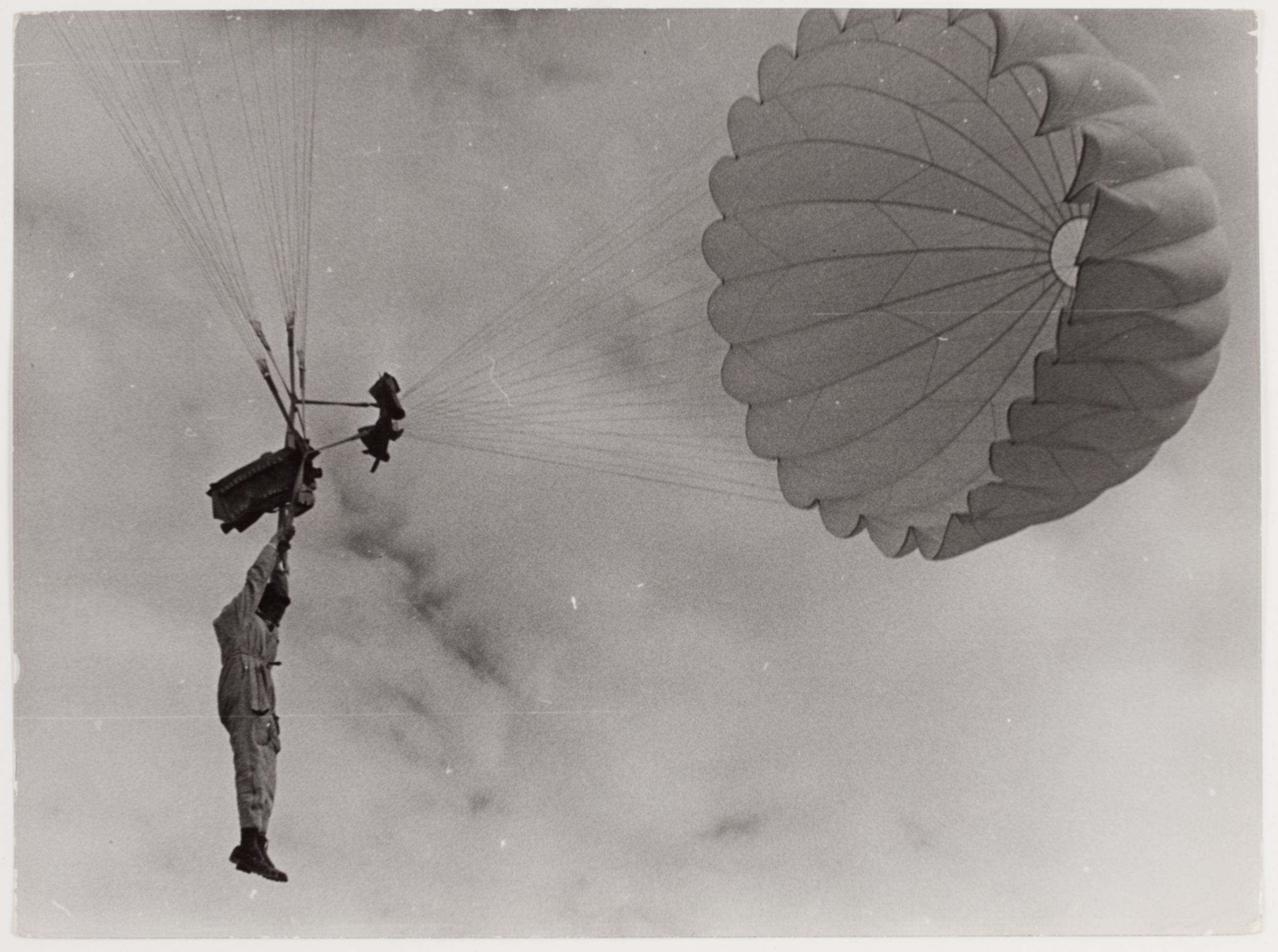 [French air force parachute, Parachutist hanging from open parachute in ...