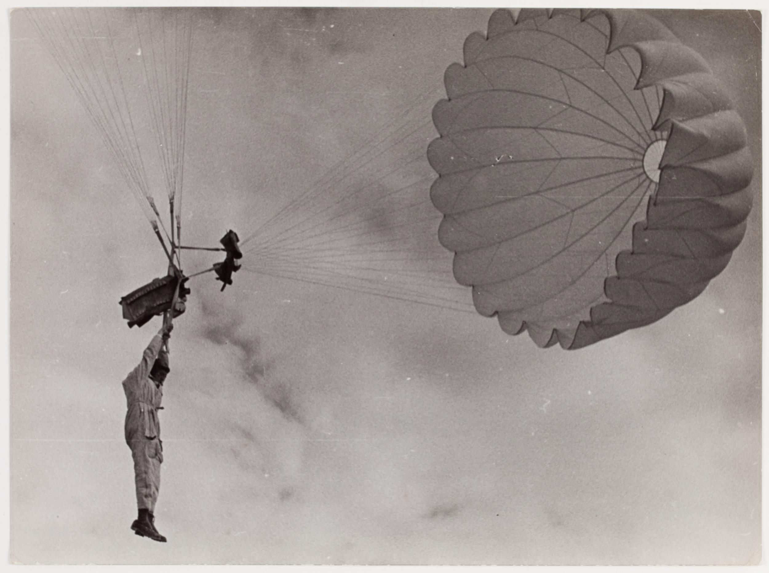 [French air force parachute, Parachutist hanging from open parachute in ...
