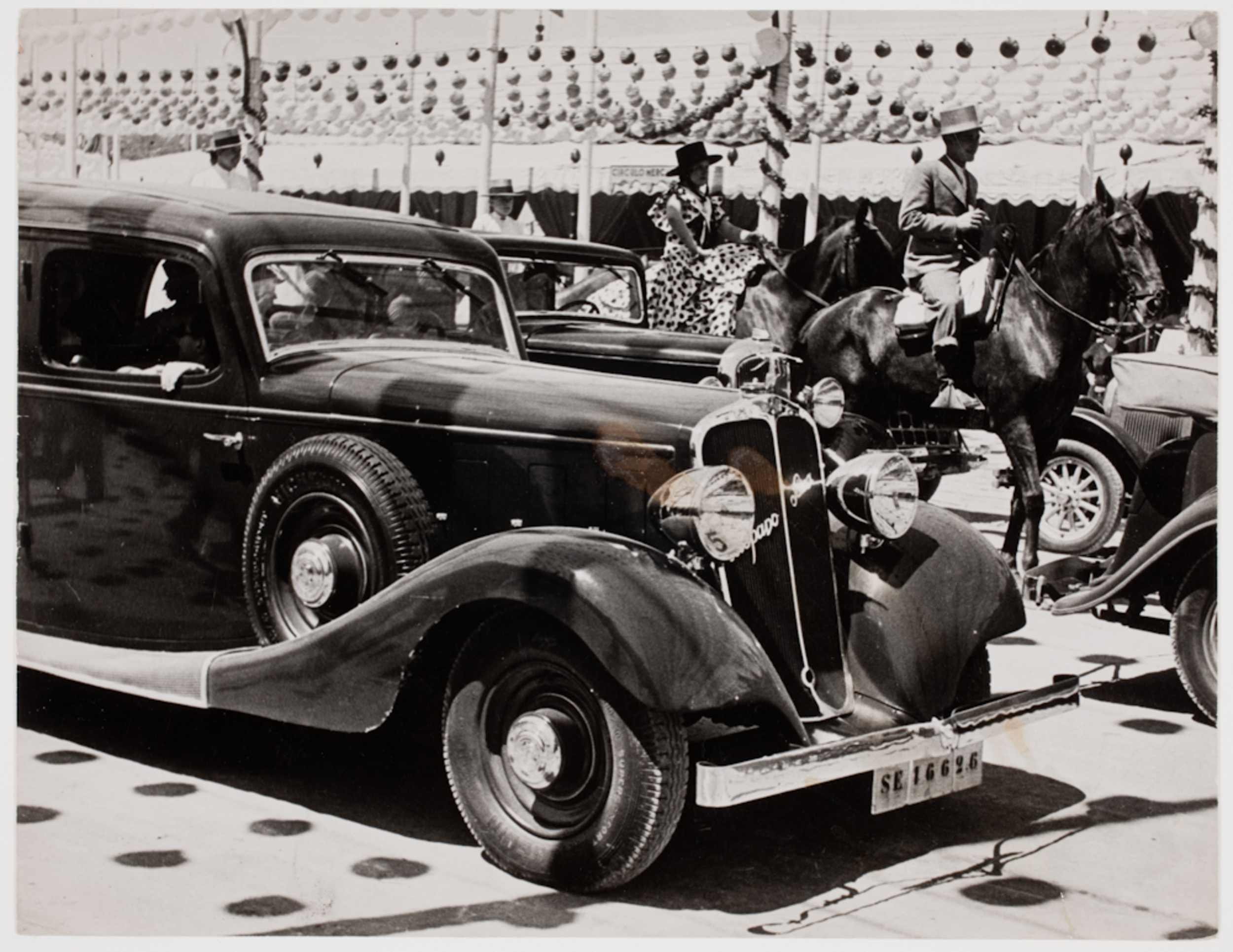 [People riding cars and horses, Seville, Spain] | International Center ...