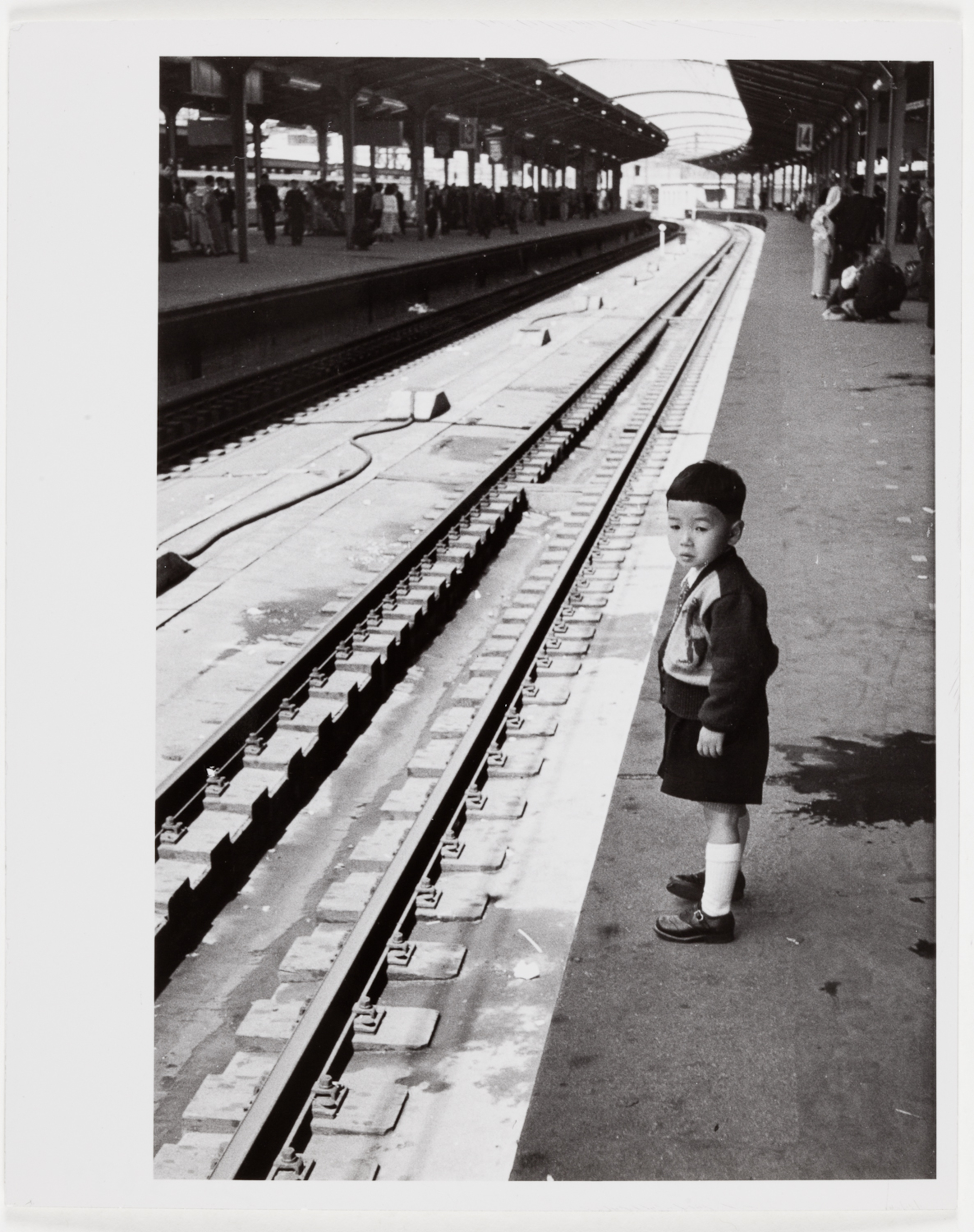 [Child standing at the station, Tokyo, Japan] | International Center of ...