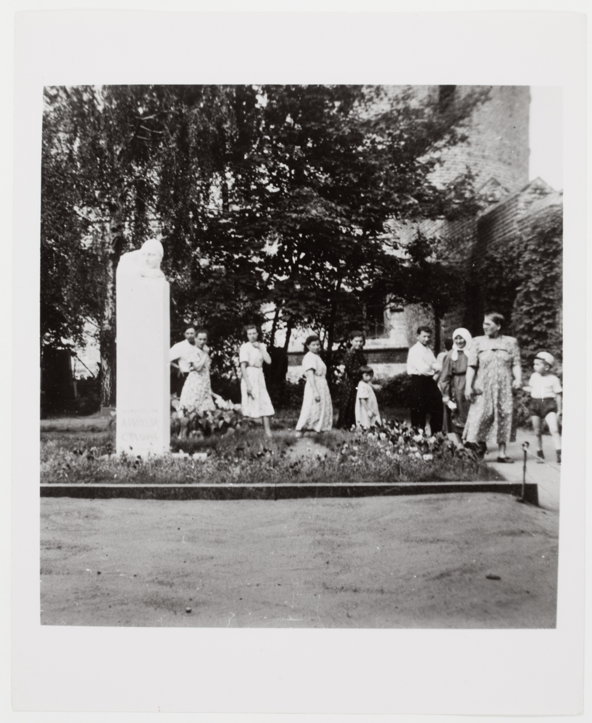 [Visitors passing the tomb of Joseph Stalin's second wife, Nadezhda ...