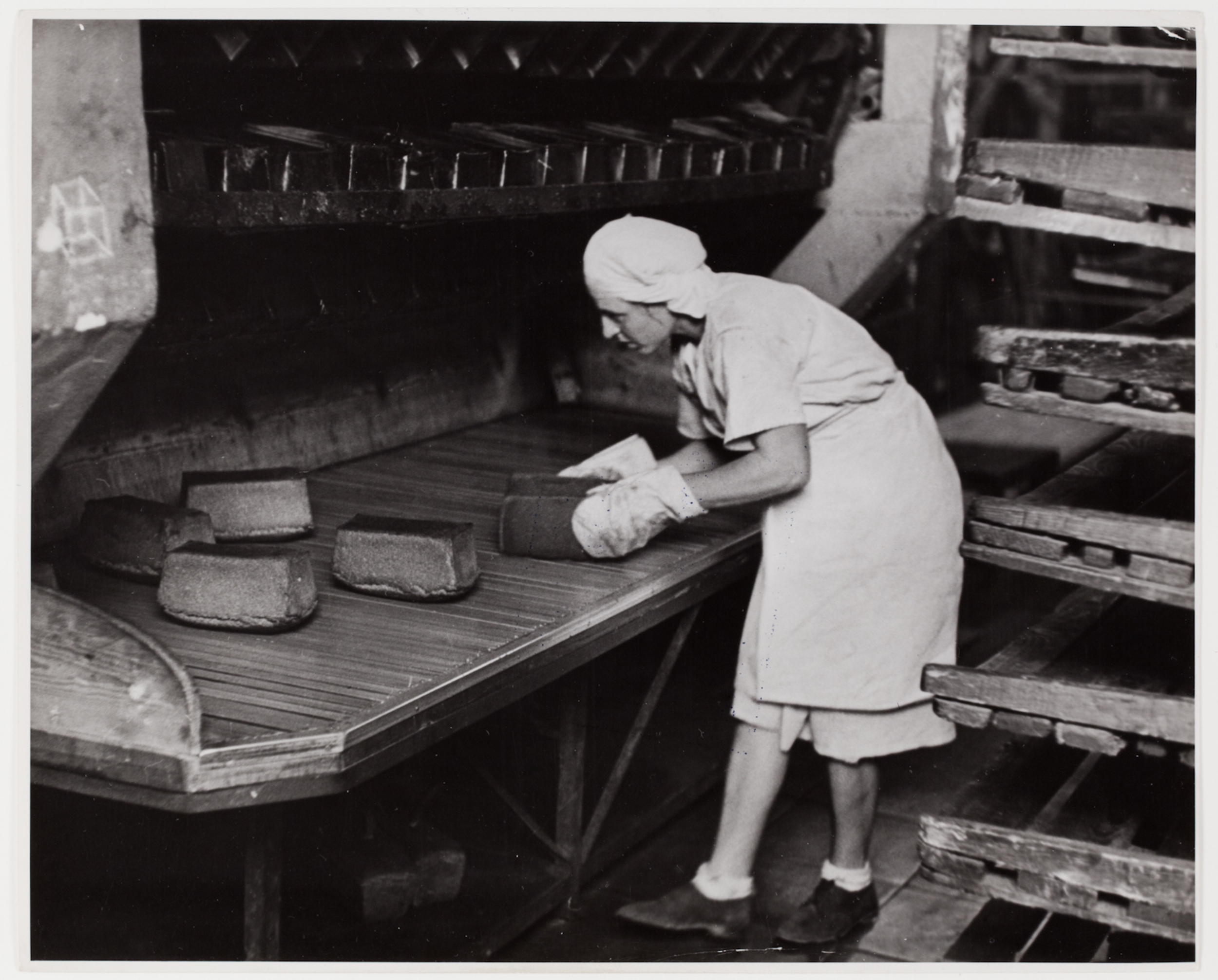[Woman baking bread in a factory, Kiev] | International Center of ...