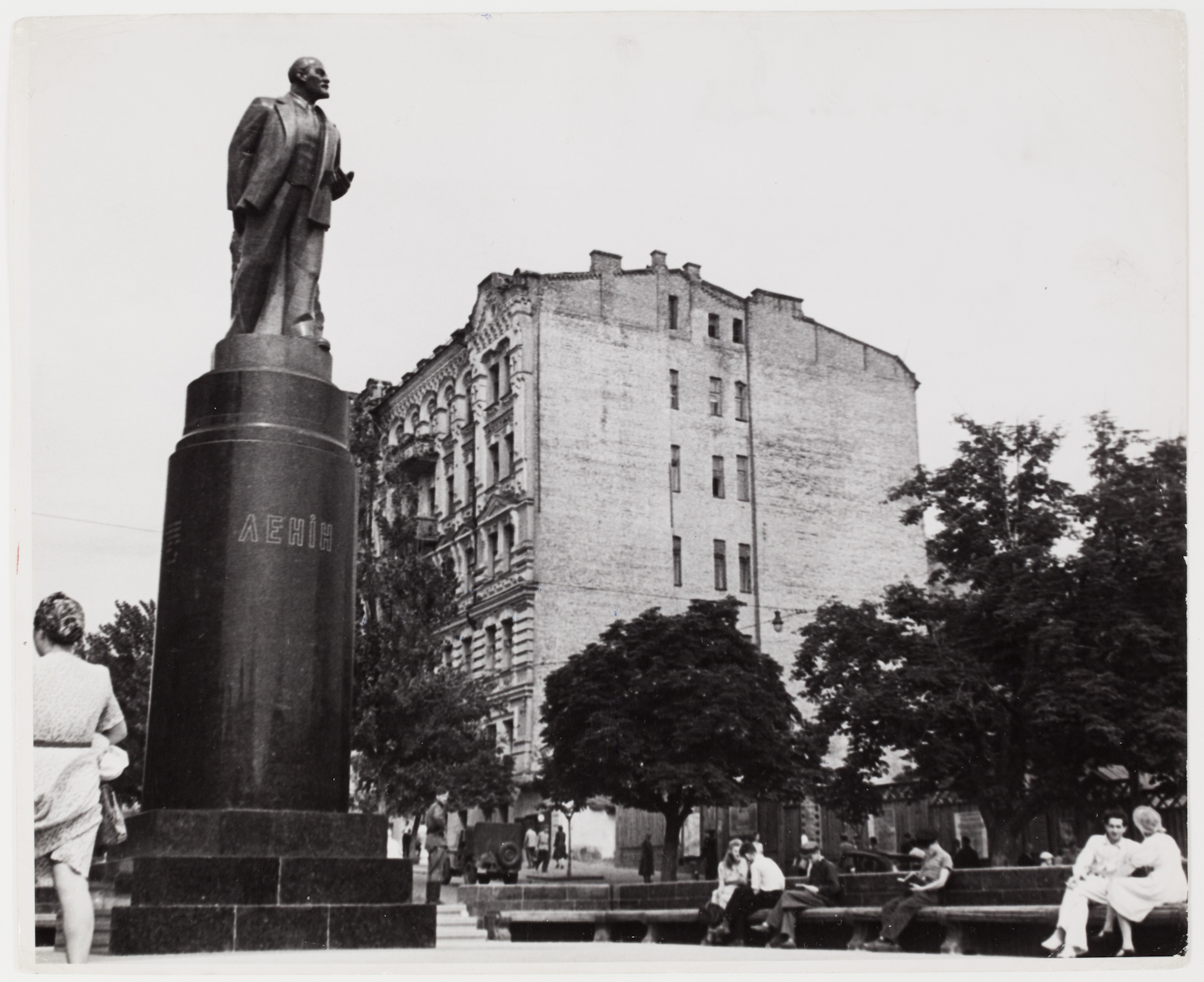 [People sitting in a park with a statue of Lenin, Kiev] | International ...