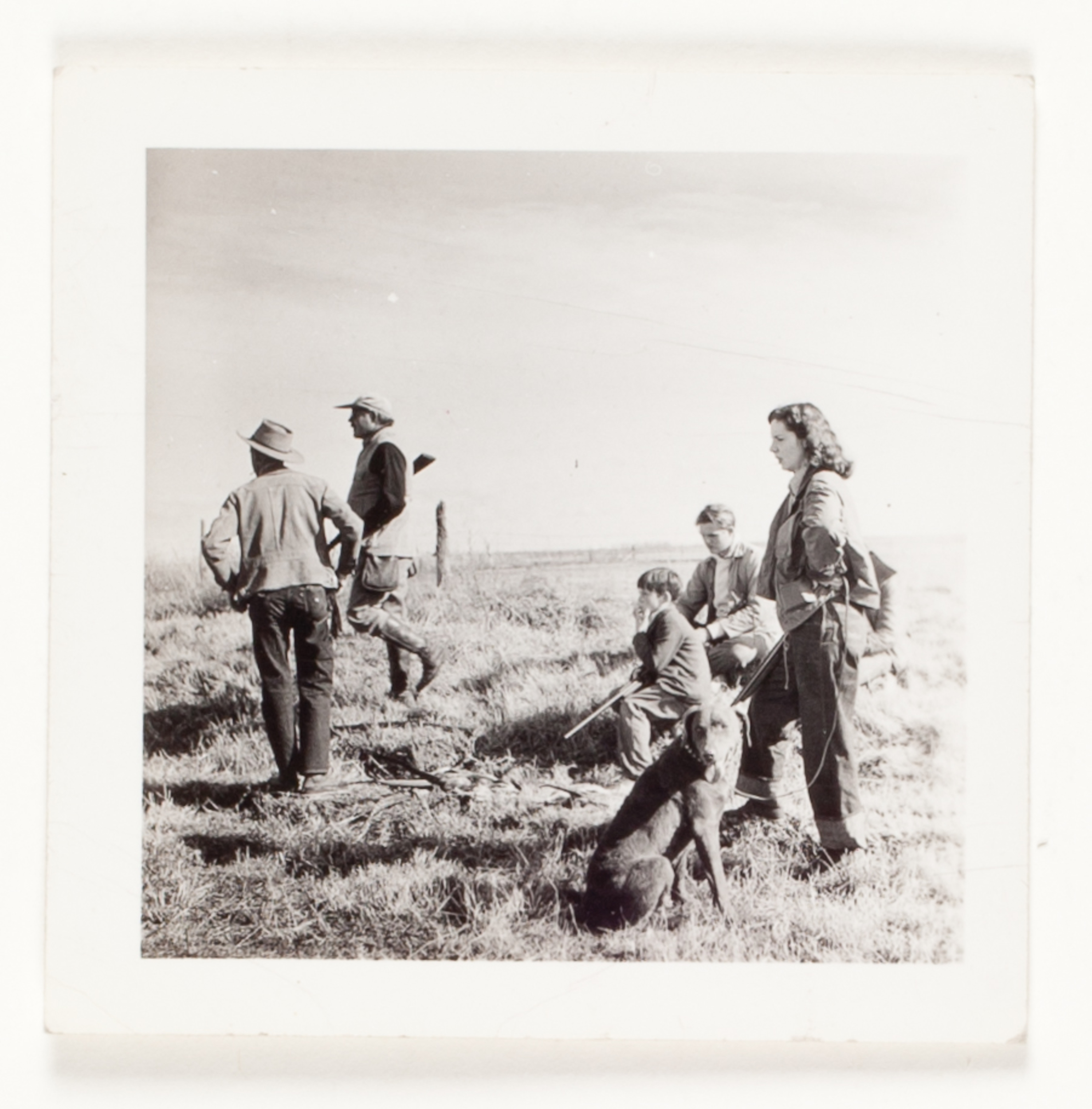 [Ernest Hemingway with sons Jack and Gregory hunting in the fields, Sun ...