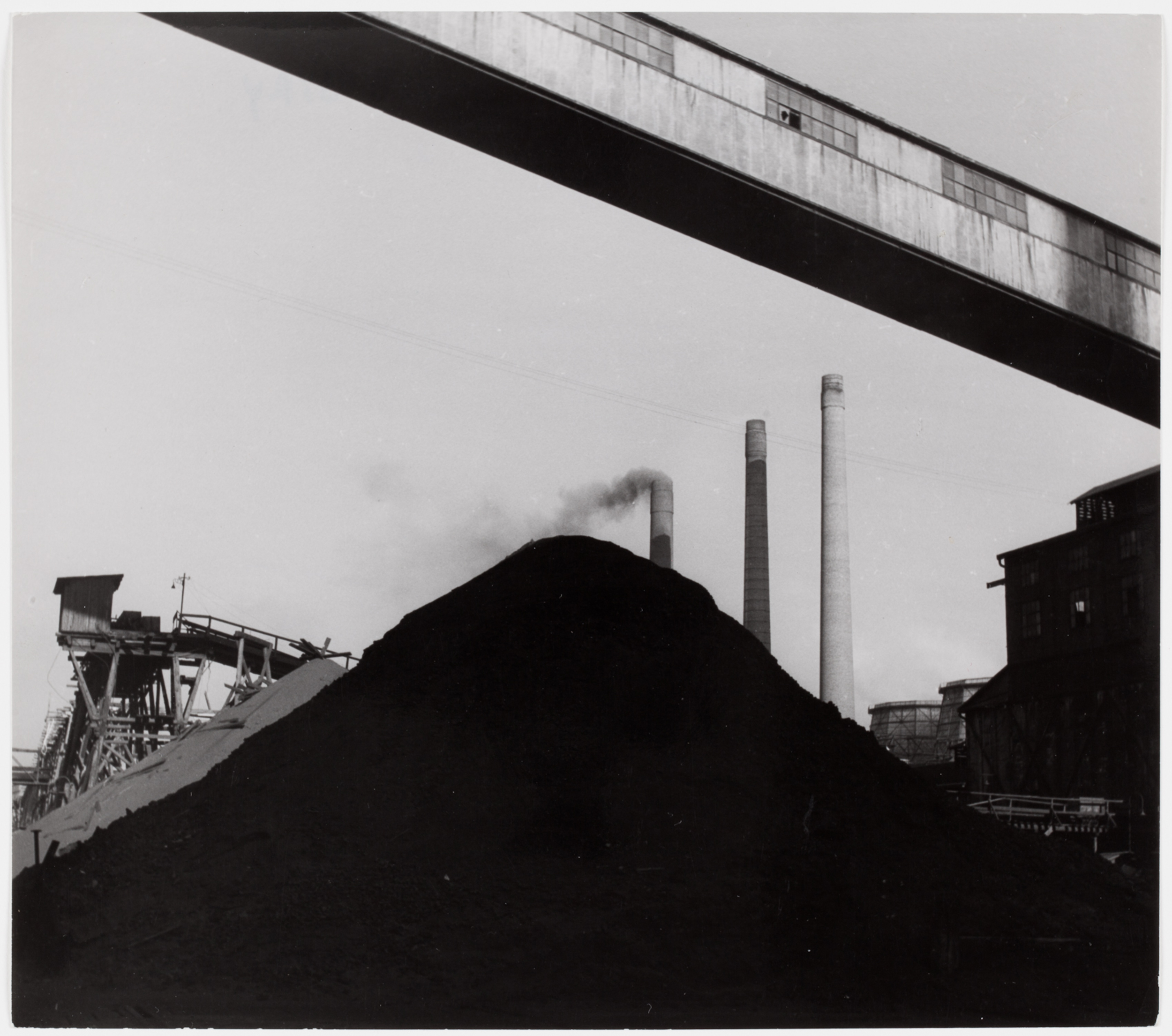 [A pile of coal outside a railroad car factory, Wroclaw; Poland ...