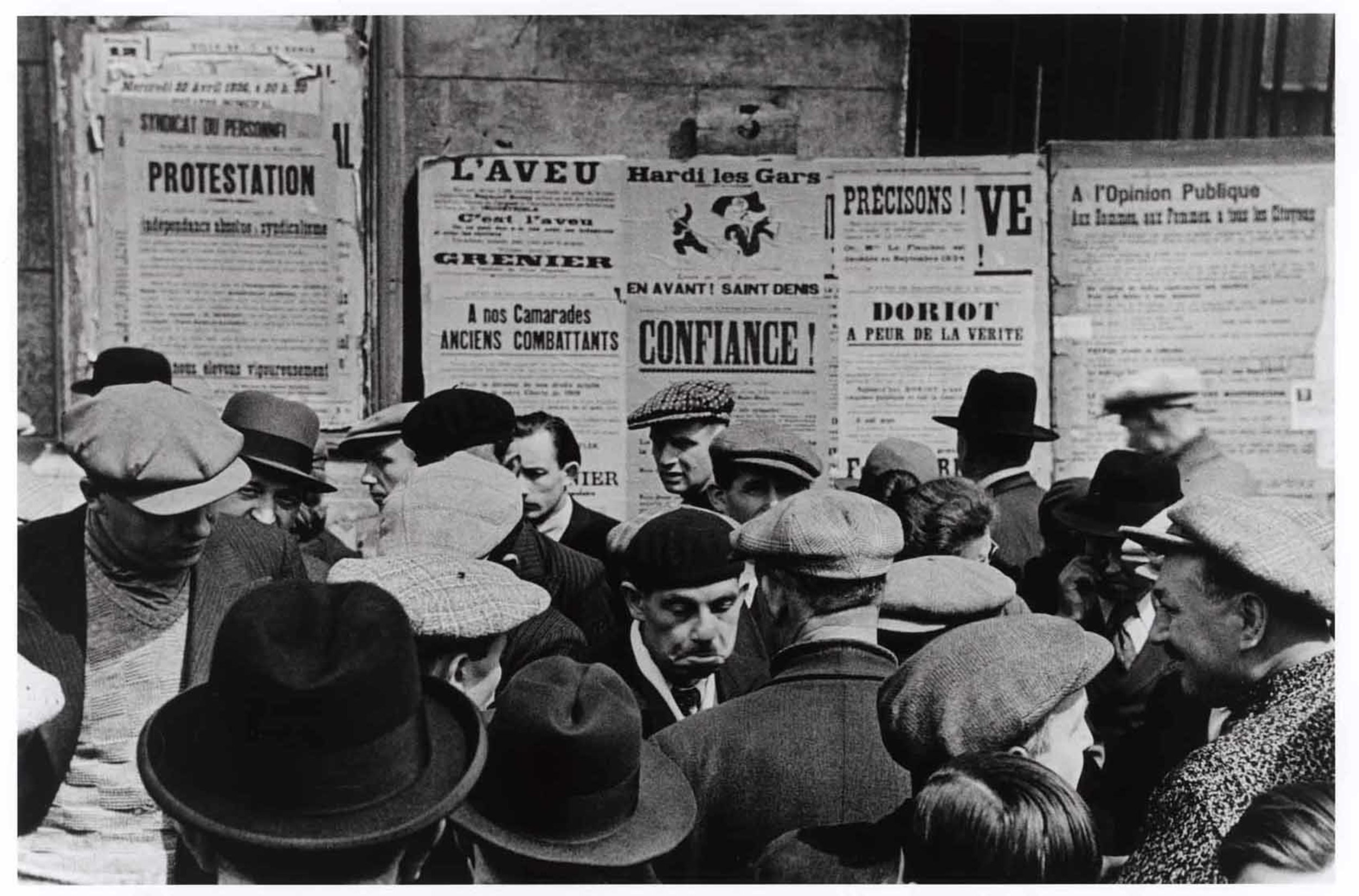 [Crowd in front of political posters the day of the election run-offs ...