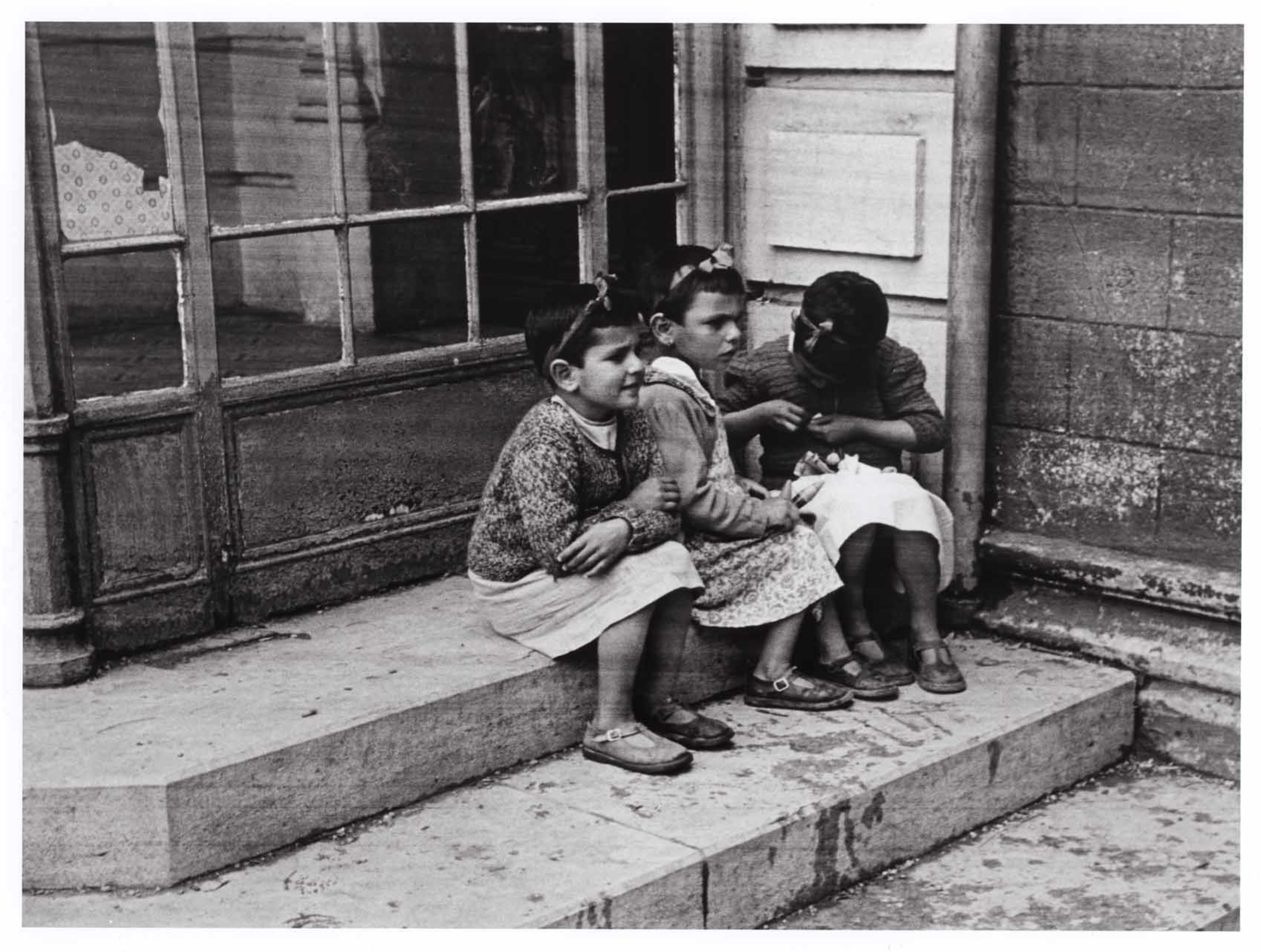 [Three Spanish Civil War orphans sitting on steps, near Biarritz ...
