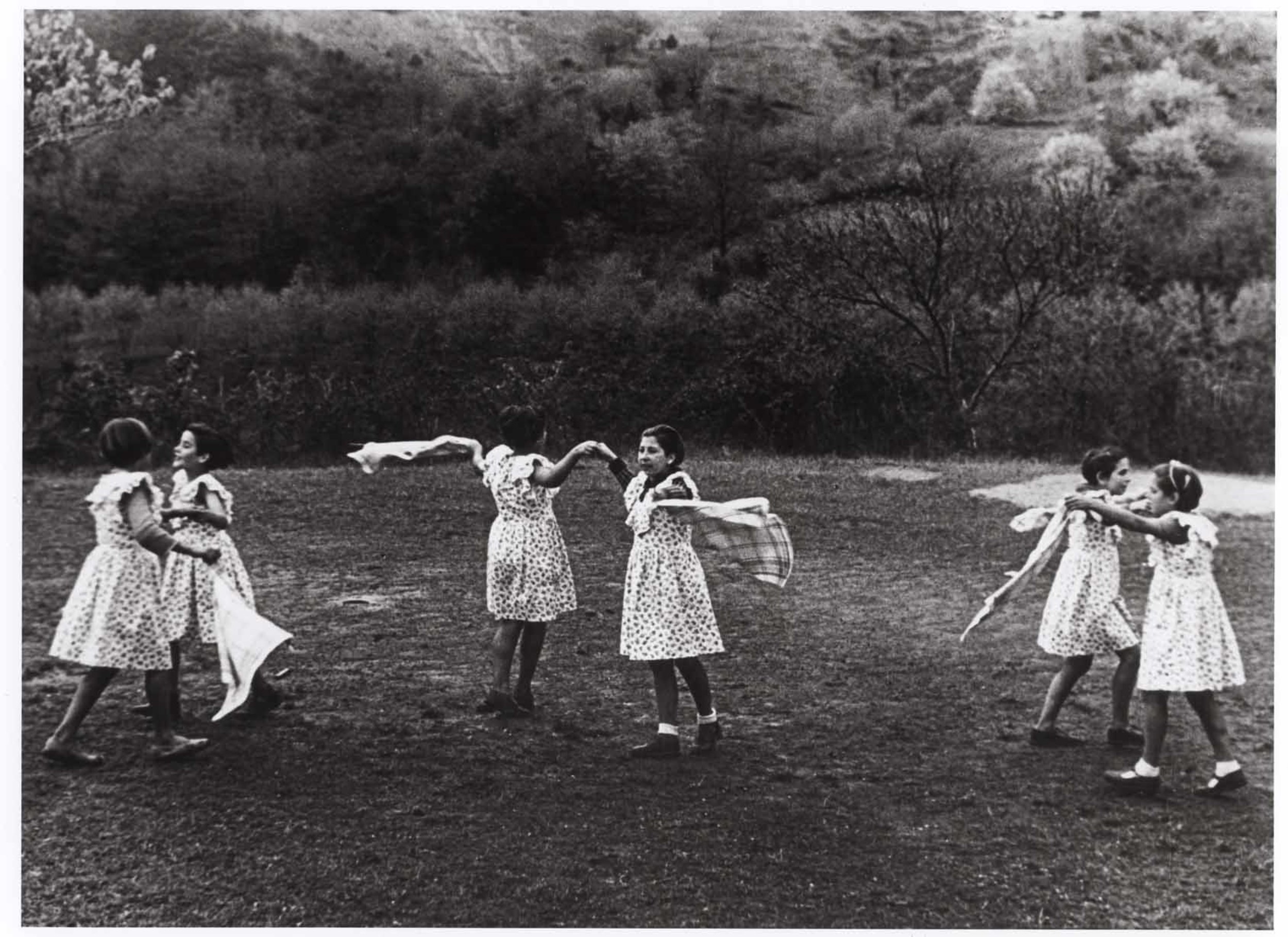 [Six Spanish Civil War orphans dancing in a field, near Biarritz ...