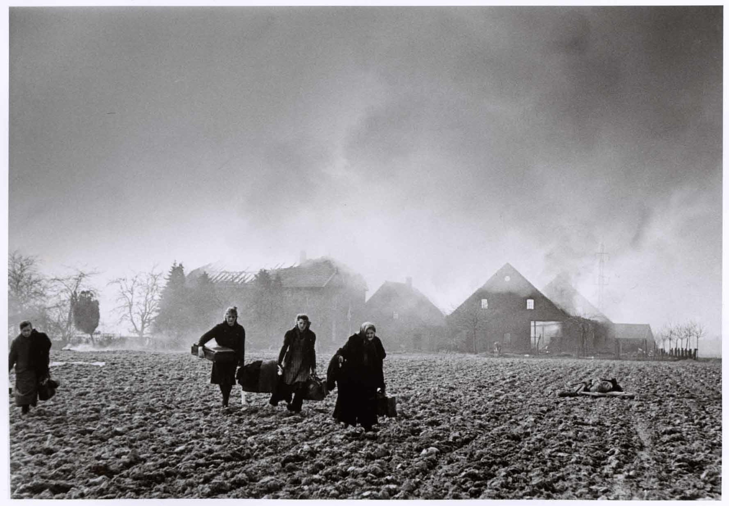 [German farmers fleeing from their burning house, near Wesel, Germany ...