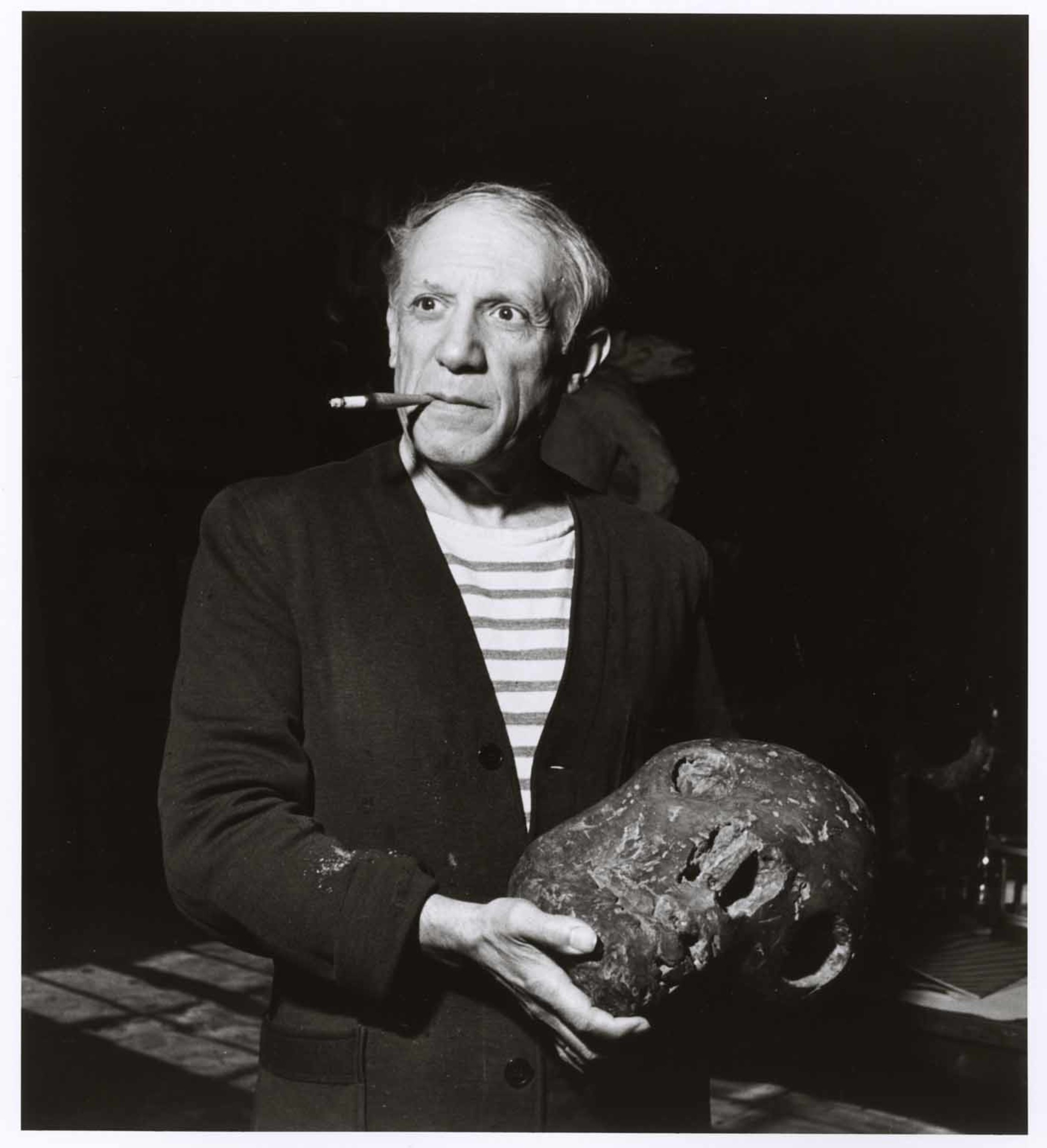 [Pablo Picasso holding a skull in his studio, Paris] | International ...
