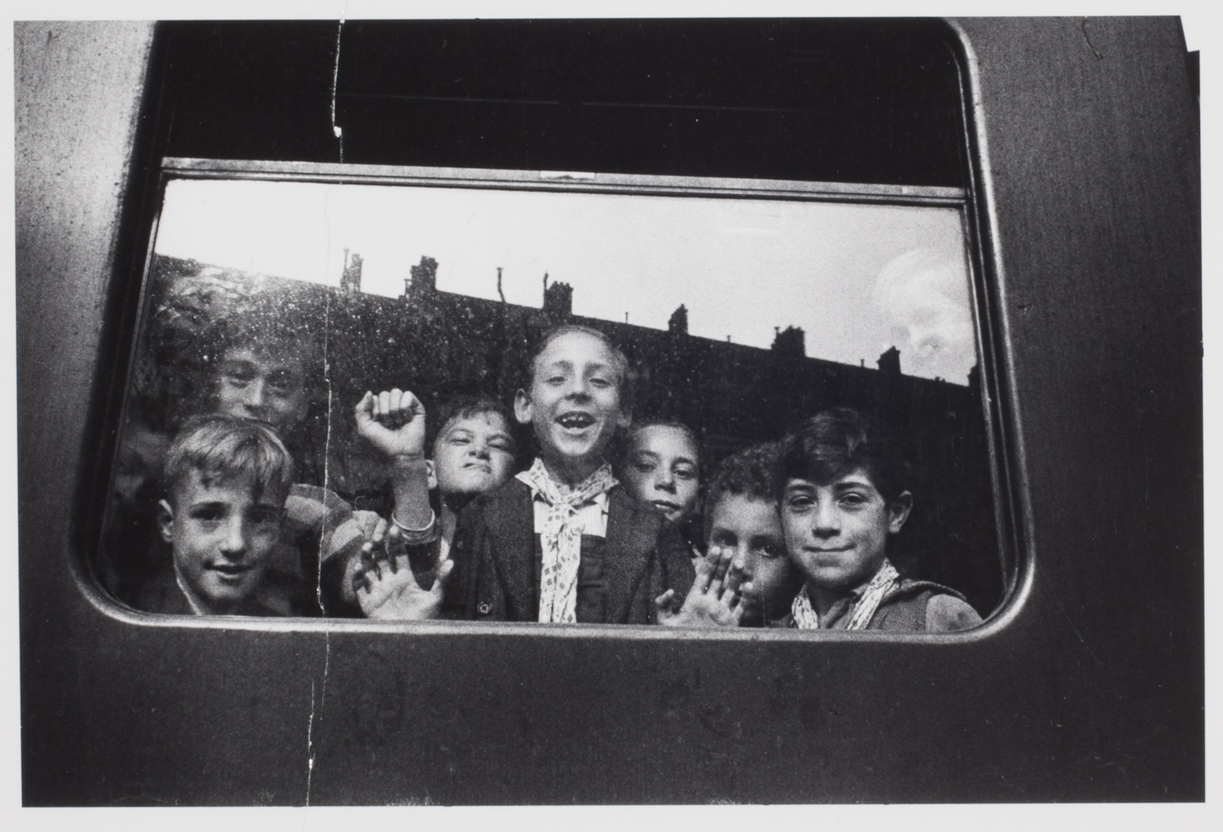 [Children looking out a train window before vacations, France ...