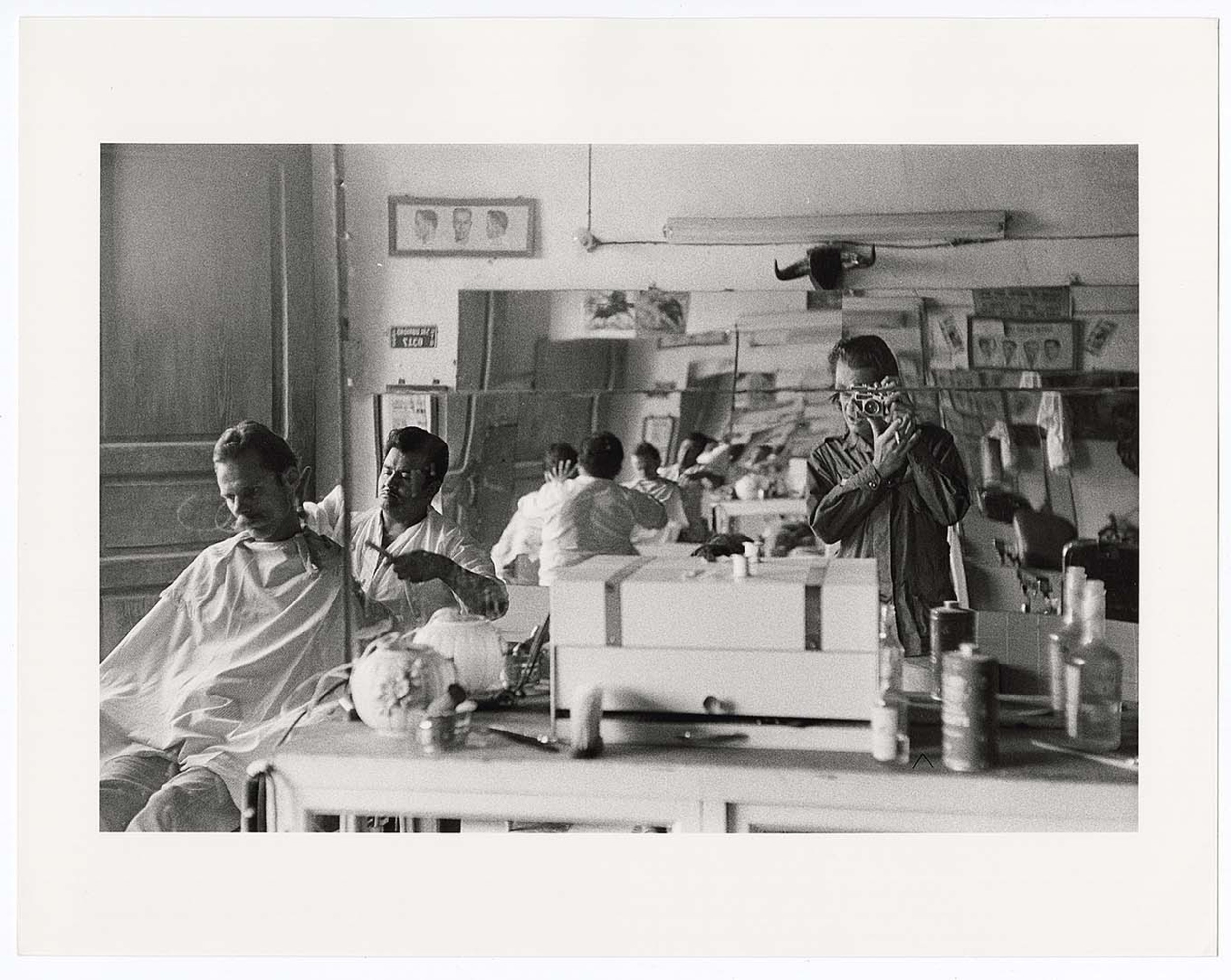 [Self-portrait in barber shop] | International Center of Photography