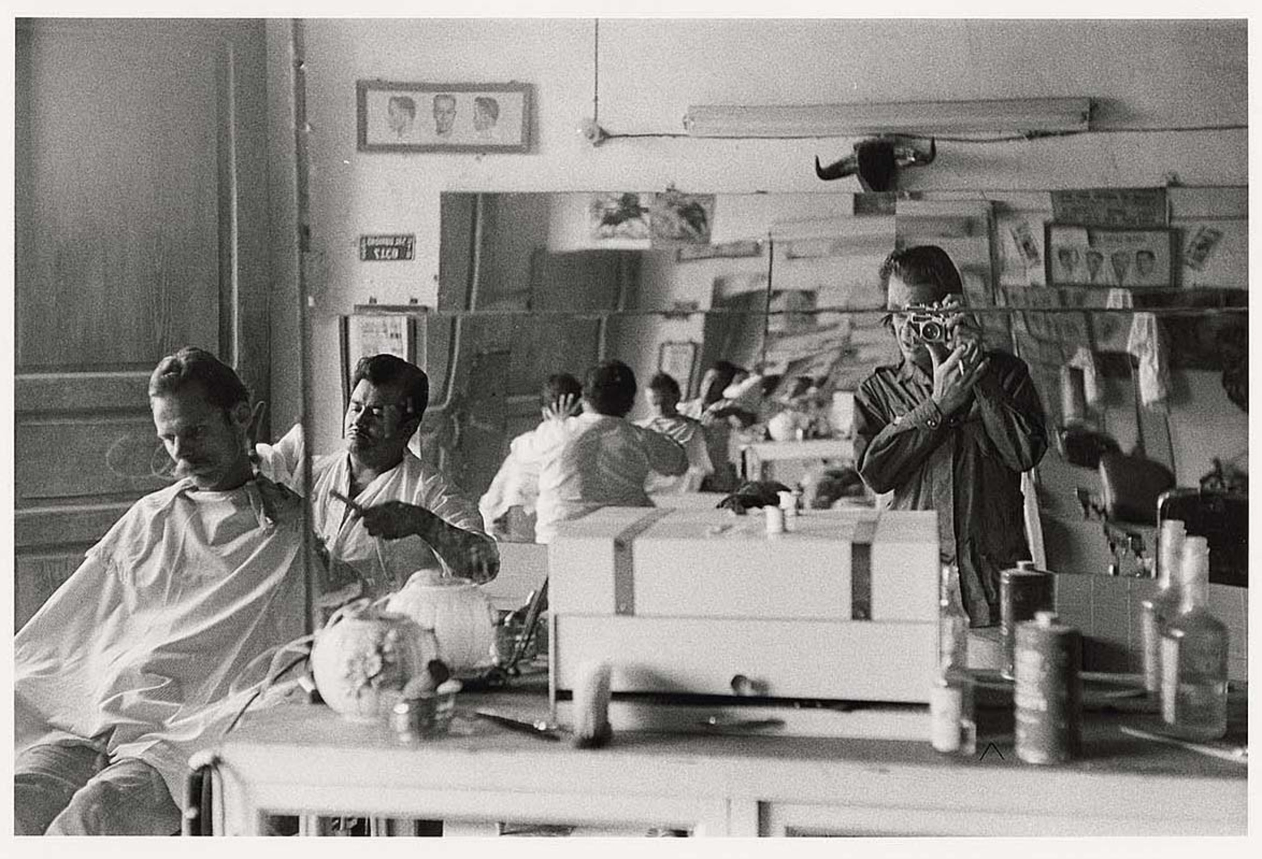 [Self-portrait in barber shop] | International Center of Photography