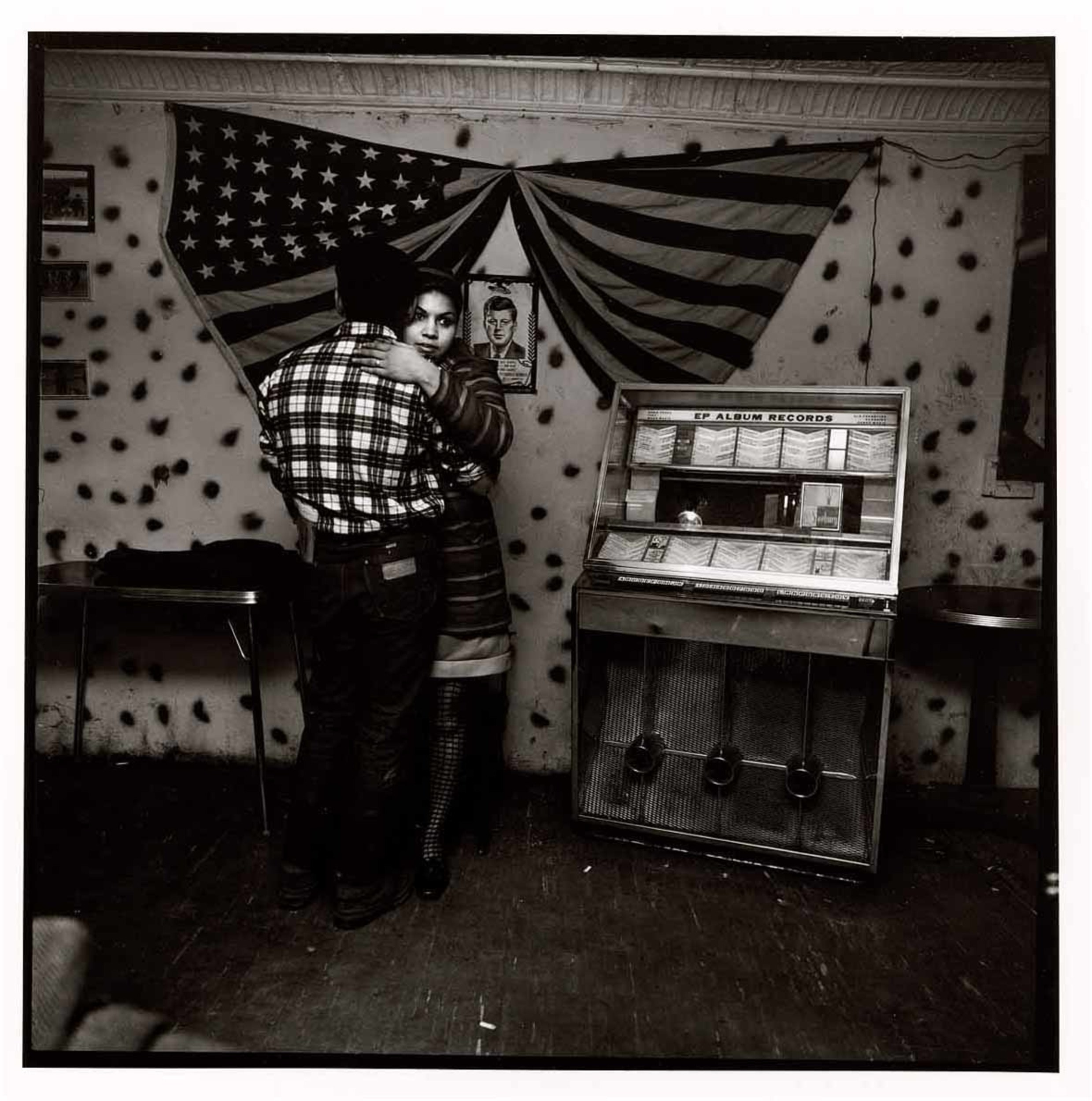 [Couple dance to jukebox] | International Center of Photography