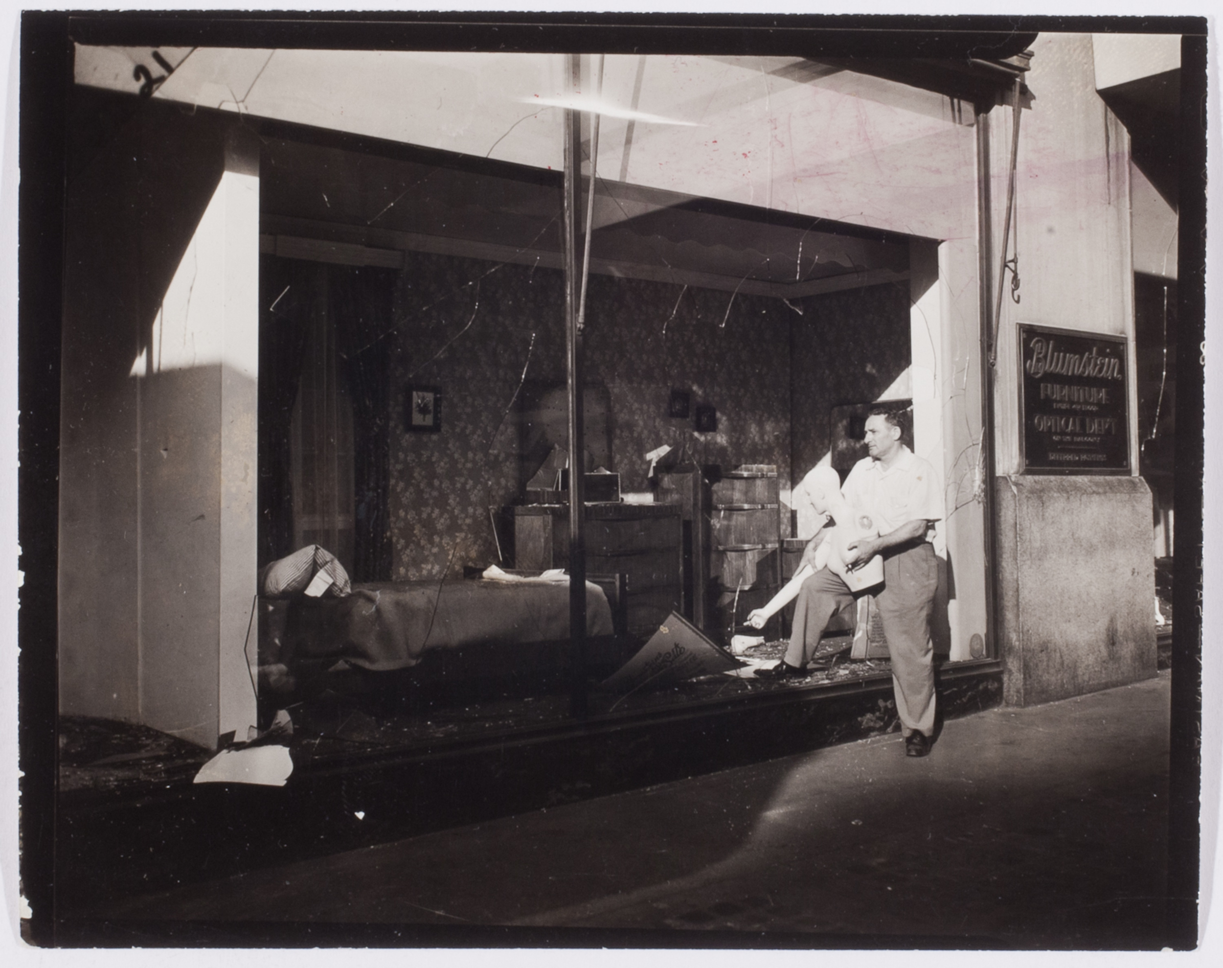 [The Leader Work Clothes storefront after riots, Harlem, New York ...